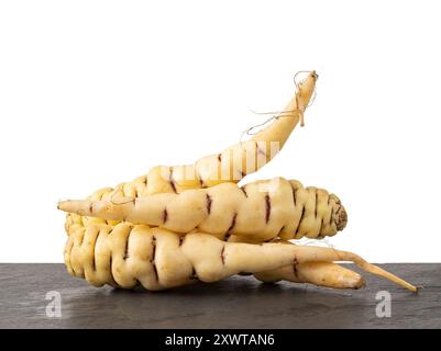 Colombian cubios on white background - Organic tubers. Tropaeolum ...