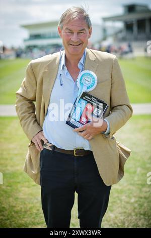 Reform UK MP Rupert Lowe attends a farmers protest in Whitehall, London ...