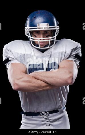 Portrait of American football player against cloudy sky Stock Photo - Alamy
