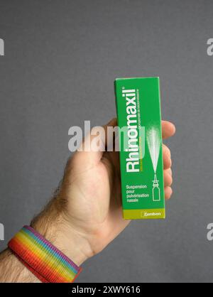 Paris, France - Dec 24, 2024: A male hand holding an Amazon Prime ...