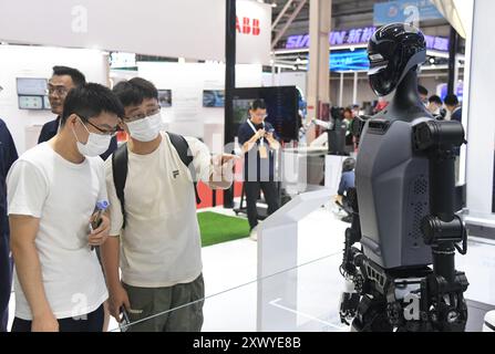 Beijing, China. 21st Aug, 2024. Intelligent robotic hands are pictured ...