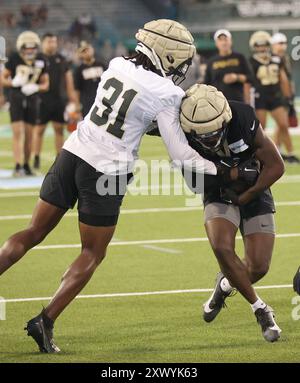 New Orleans Saints safety Jordan Howden (31) signs autographs during an ...