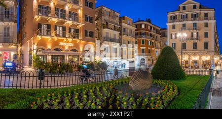 View of restaurants and bars in Pot throwing (Botides) at dusk, Corfu ...