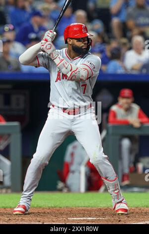Los Angeles Angels' Jo Adell, left, scores as Texas Rangers catcher ...