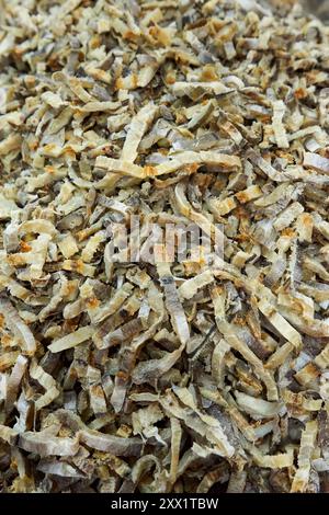 A large assortment of dried fish is on display in the Asian store Stock ...