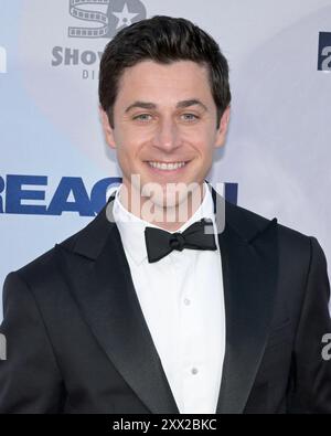 HOLLYWOOD, CALIFORNIA - AUGUST 20: (L-R) David Henrie and Maria Cahill ...