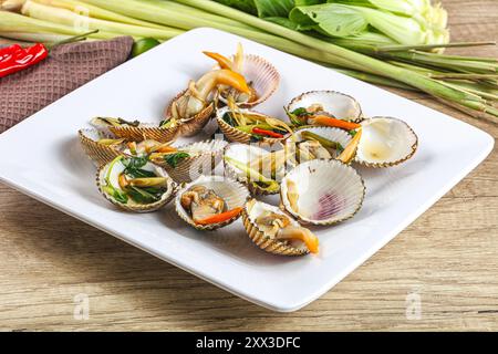 Delicous Asian mollusk shell steamed with spices Stock Photo - Alamy