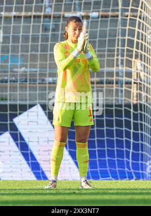 Bayern Munich goalkeeper Maria-Luisa Grohs saves a penalty during the ...