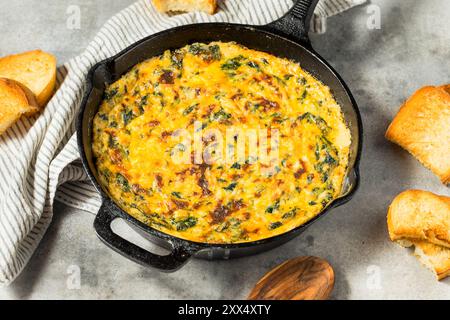 Healthy Baked Spinach Maria Dip with Cheese and Toast Stock Photo - Alamy