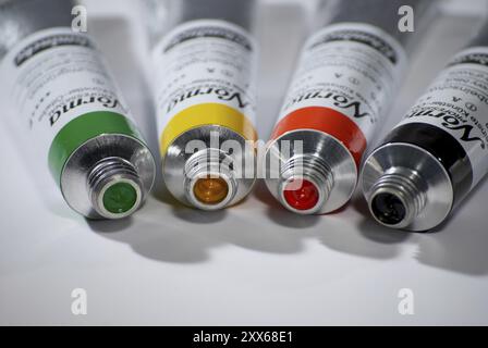 Four paint tubes, artist colours, green, yellow, red, black Stock Photo ...