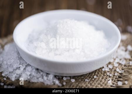 Portion of Coarse Salt on vintage background (selective focus; close-up ...