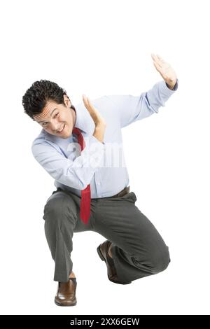 Intimidated Latino Office Worker Protecting Abuse Stock Photo - Alamy