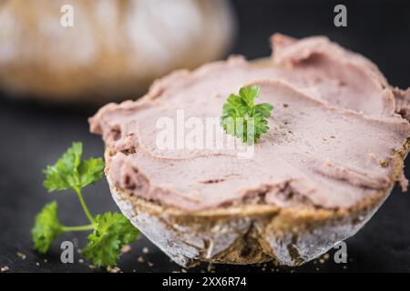 Liverwurst on a vintage background as detailed close-up shot (selective ...