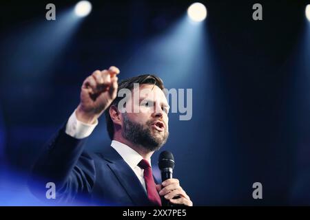Vice President JD Vance, holding his daughter Mirabel, arrives at an ...