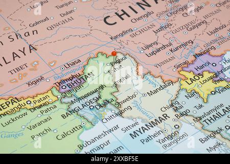 an orange pin needle into imphal city of india political map Stock ...