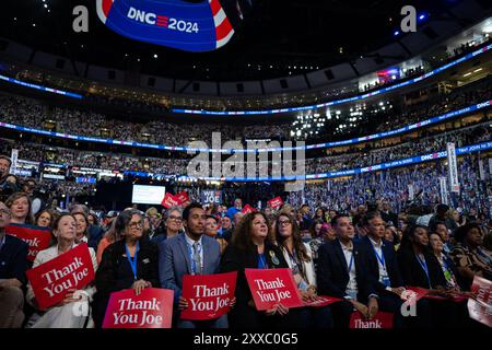 The crowd holds up signs that say “We Love Joe” as United States ...