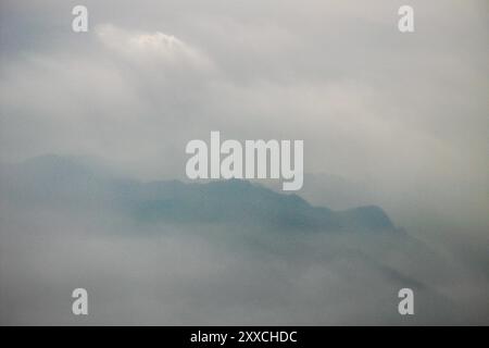 A valley filled with smog as seen from a plane on approach to Beijing ...