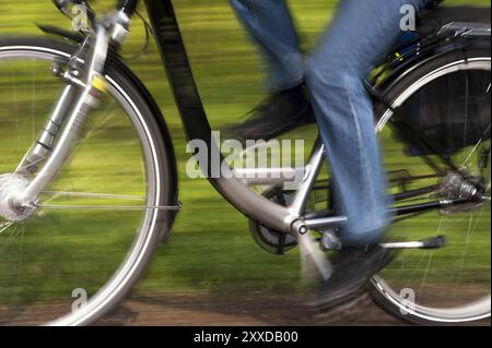 fast-moving legs of a cyclist Stock Photo - Alamy