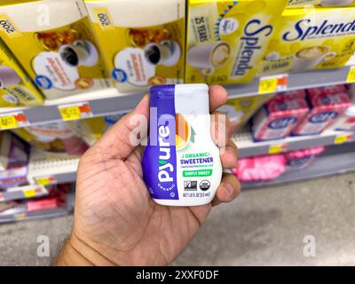 artificial sweetener container on hand Stock Photo - Alamy
