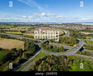 Aerial view of M56 Motorway with Stanlow oil refinery in the background ...