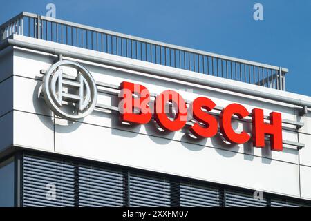 Bosch logo company sign on the wall. Bosch is a German multinational ...