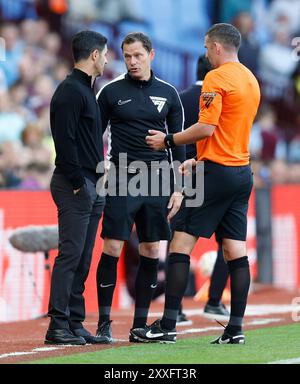 Referee Darren England (left) and Aston Villa's Youri Tielemans during ...