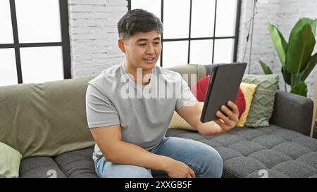Asian guy in smart casualwear explaining his girlfriend notes in ...