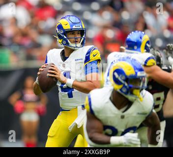 Los Angeles Rams quarterback Dresser Winn throws during an NFL football ...