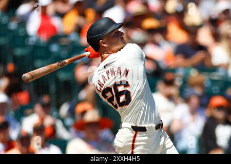 San Francisco Giants' Matt Chapman reacts after hitting an RBI double ...