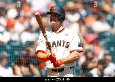 San Francisco Giants' Matt Chapman, right, is congratulated by Mike ...