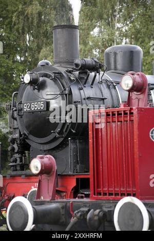 Steam locomotive and diesel locomotive (red, in the foreground Stock ...