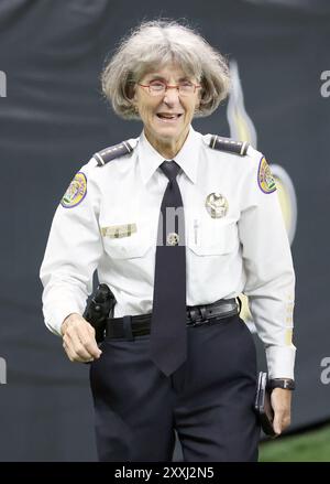 New Orleans police chief Anne Kirkpatrick greets Mitch Landrieu before ...