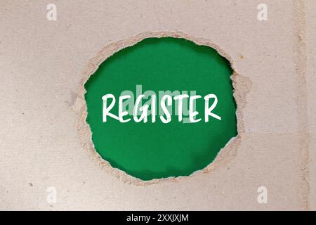 Register message written on ripped torn paper piece with red background ...