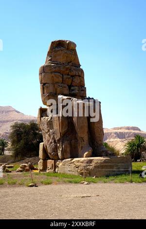 The colossal statues of Memnon stand majestically in Egypt ...