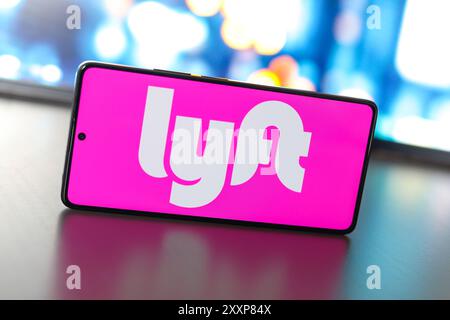 In this photo illustration, the Lyft, Inc. logo is displayed on a ...