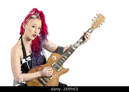 rock'n'roll singer with red hair,guitar and microphone Stock Photo - Alamy