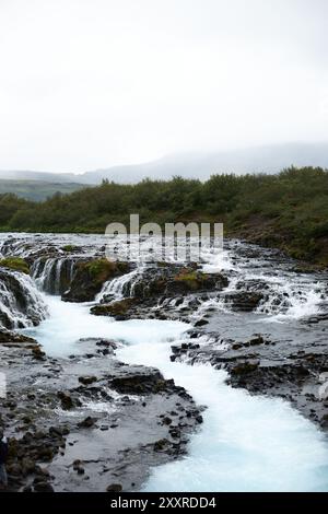 Bruarafoss waterfall Iceland. Waterfall with clear blue water Stock ...