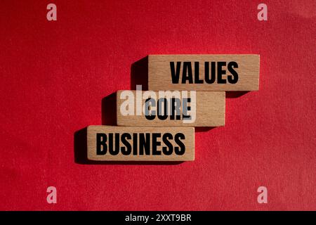 Business core values message written on wooden blocks with blue ...