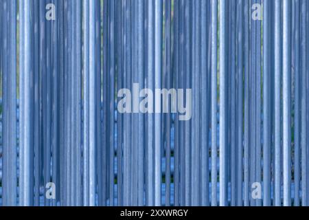 Metal fence. Vertical lines. Backgrounds and textures Stock Photo - Alamy