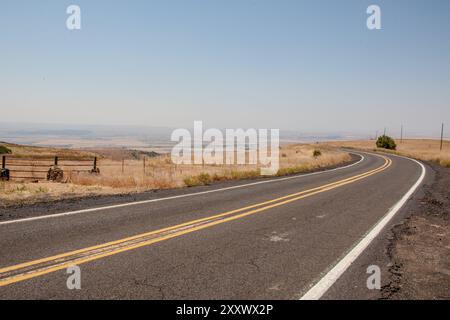 A winding road meanders through Pendleton, Oregon, tracing the contours ...