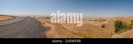 A winding road meanders through Pendleton, Oregon, tracing the contours ...