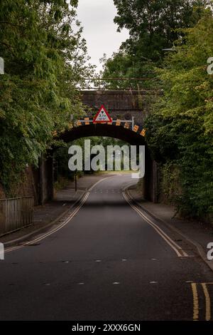 UK bridge clearance height warning sign. Low bridge concept, red ...