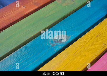 Rainbow wooden table outdoors with ashtray, hardwood and wood stain ...