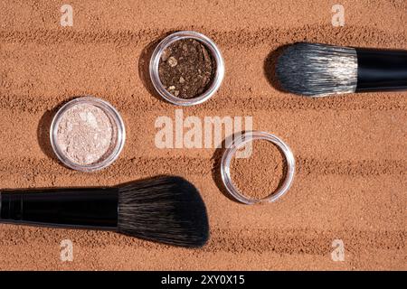 View from above makeup and makeup brushes on pink background - knolling ...