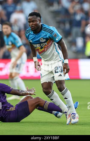 Sporting Kansas City forward Willy Agada (23) defends Los Angeles ...