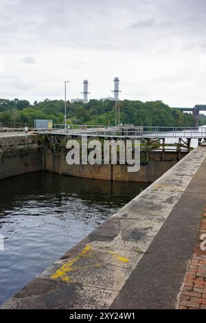 Irlam Manchester ship canal. A tranquil canal lock scene with a paved ...