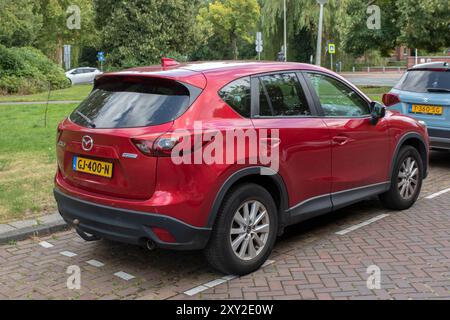 A Red Mazda CX-5 At Amsterdam The Netherlands 23-5-2024 Stock Photo - Alamy