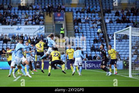 Coventry City's Jack Rudoni (second from right) scores their side's ...