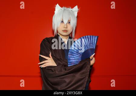 Cosplayer Jamie of Brooklyn is dressed as Nanami Momozono from Kamisama ...