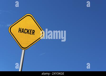 Hacker - yellow sign with blue sky Stock Photo - Alamy
